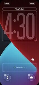 How to Stretch the Clock on the Lock Screen in iOS 26